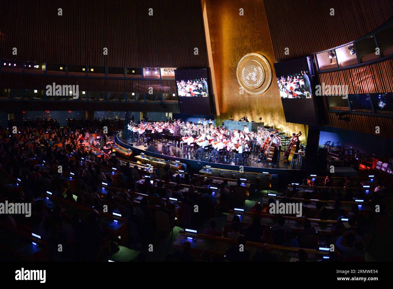 An orchestra performs during a concert entitled Lang Lang and Friends ...