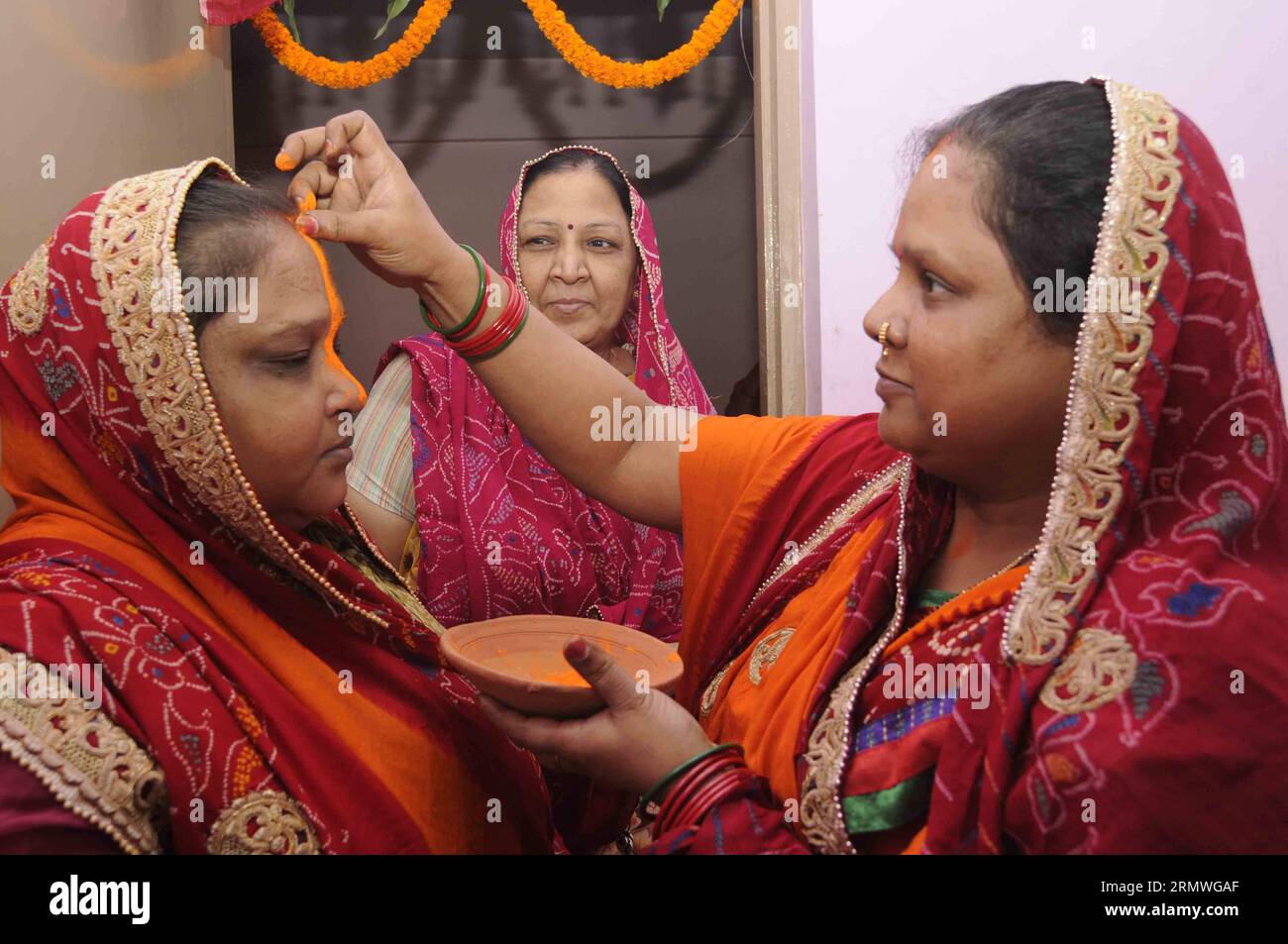 PATNA, -- Chhath devotees do the rituals during Kharna puja on the eve ...