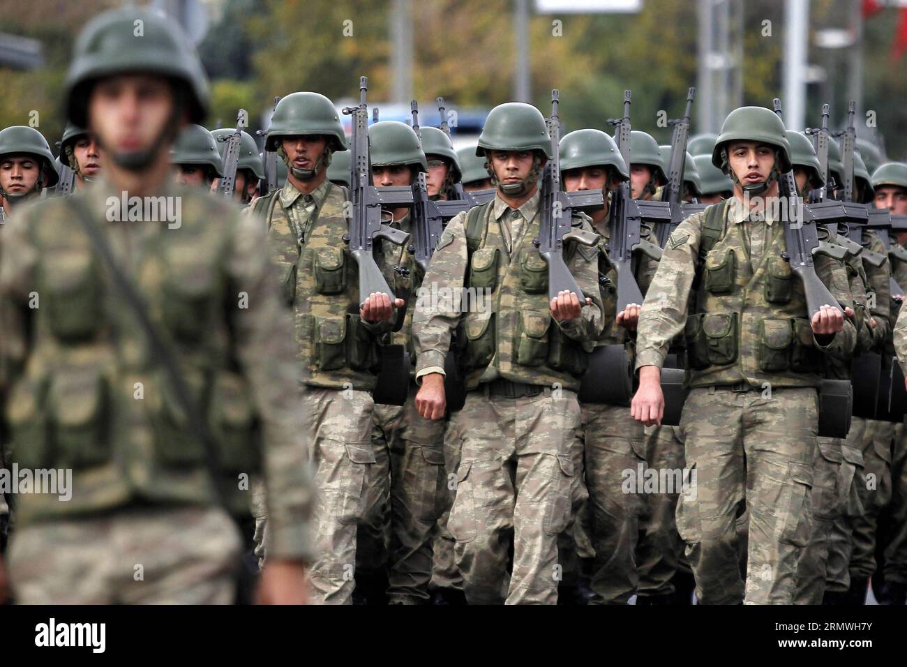 Turkish soldiers march in a military parade marking the 91st Republic ...