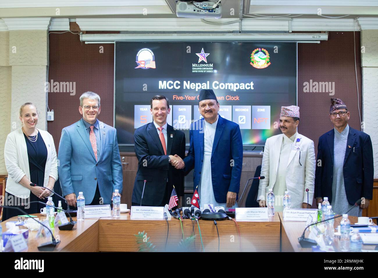 Finance Minister Dr. Prakash Sharan Mahat (R) and MCC's Vice President ...