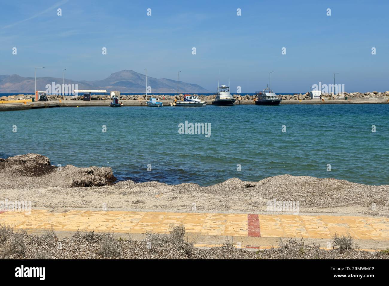 Promenade along the sea in Mastichari village on the island of Kos ...