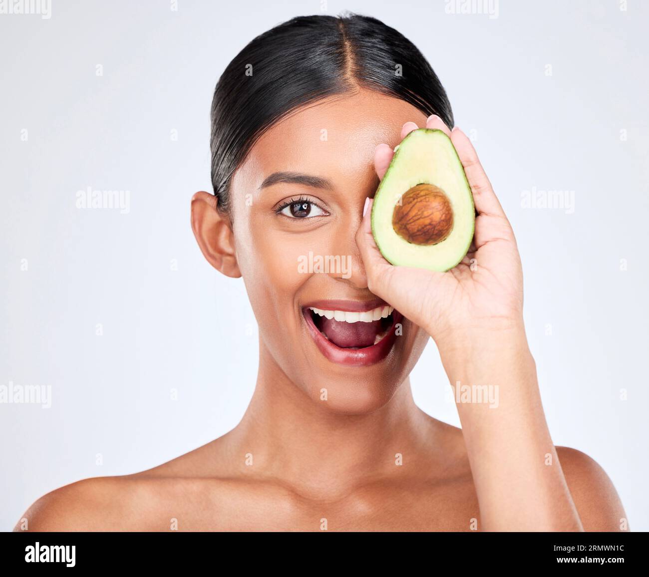Avocado, portrait and natural skincare of woman in studio for vitamin c ...