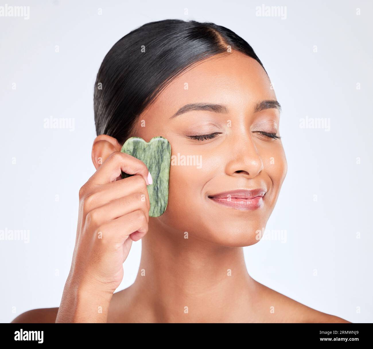 Woman, face and gua sha, natural beauty and tools with jade stone for ...