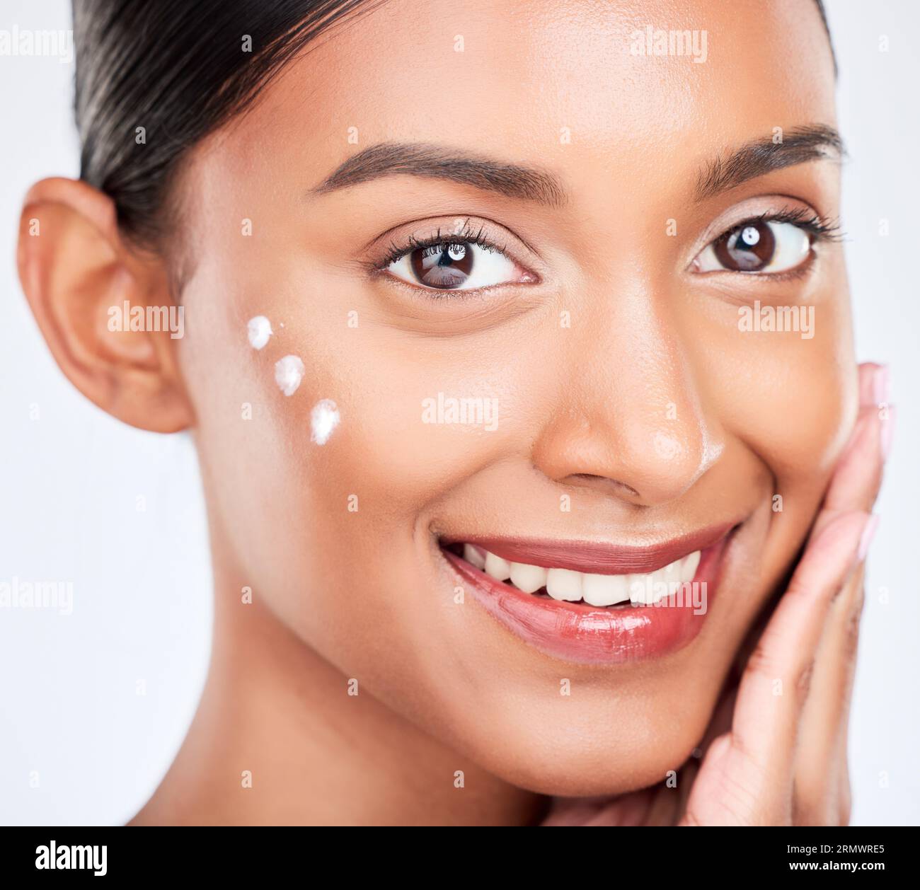 Portrait, cream and woman with cosmetics, smile and dermatology on a ...