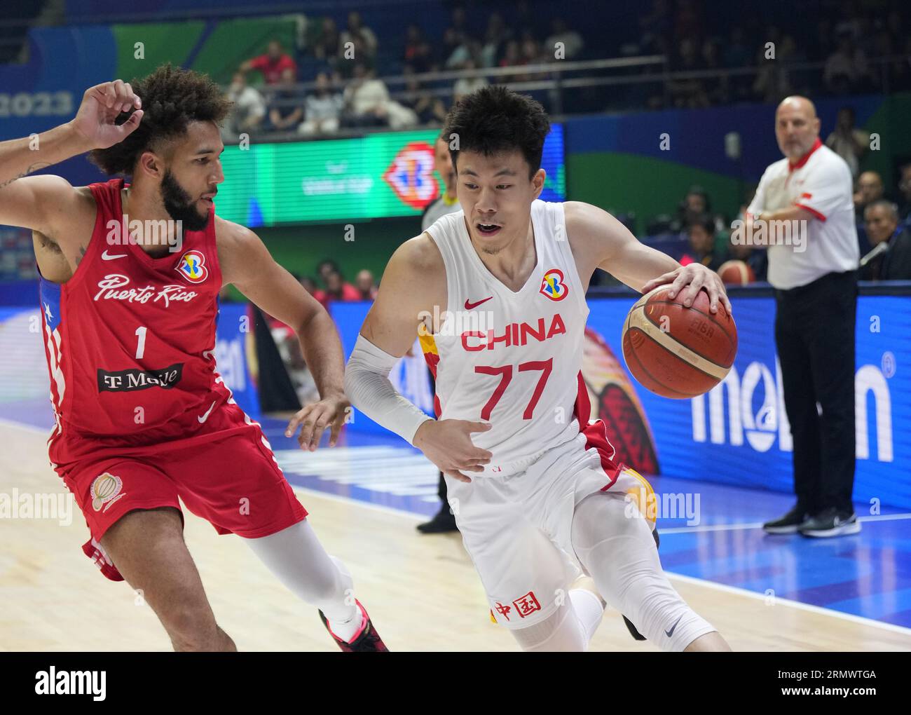 Manila, Philippines. 30th Aug, 2023. Zhang Zhenlin (R) of China vies ...