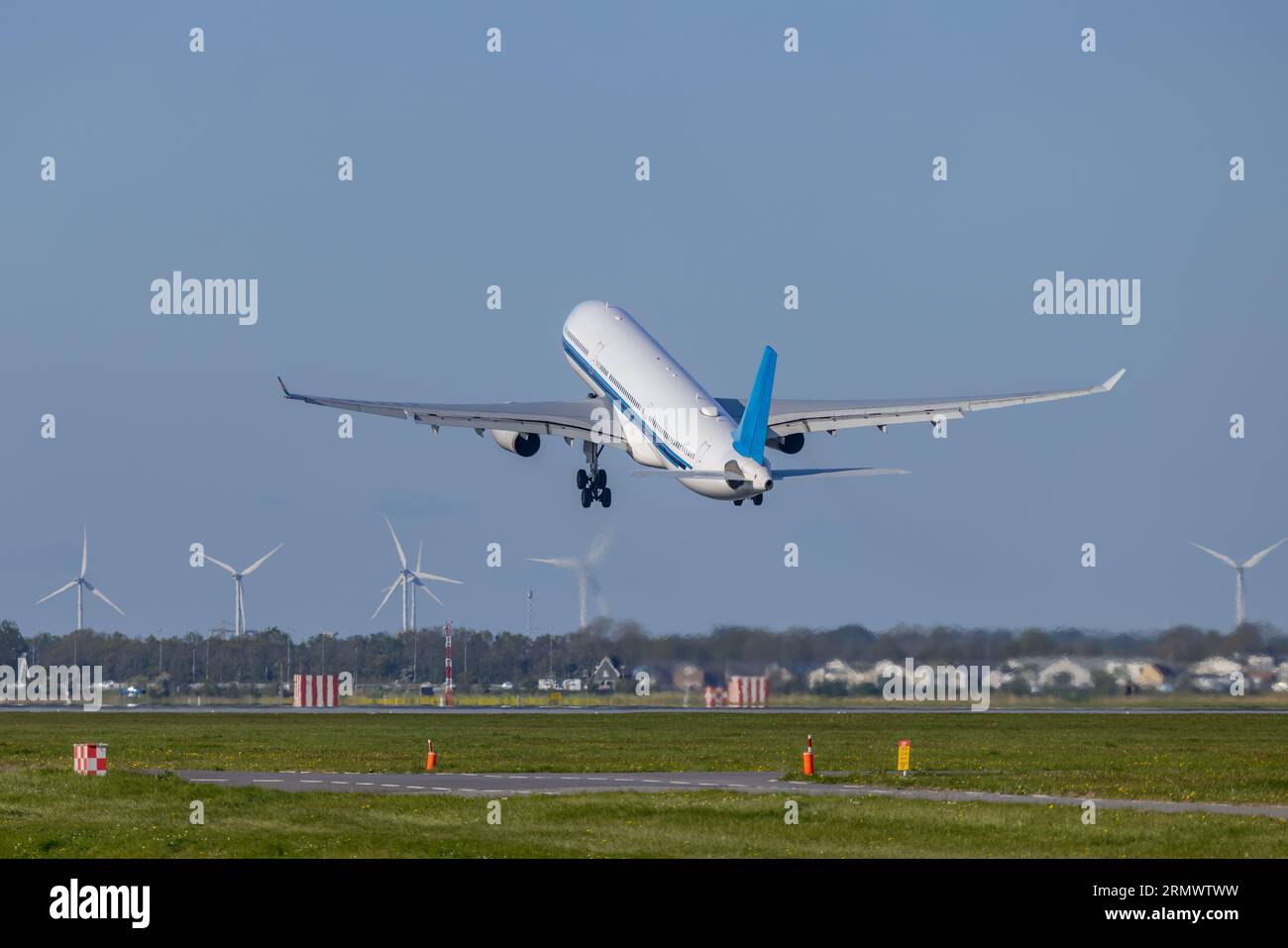 Passenger plane taking off from the runway, Schiphol, Amsterdam, The ...