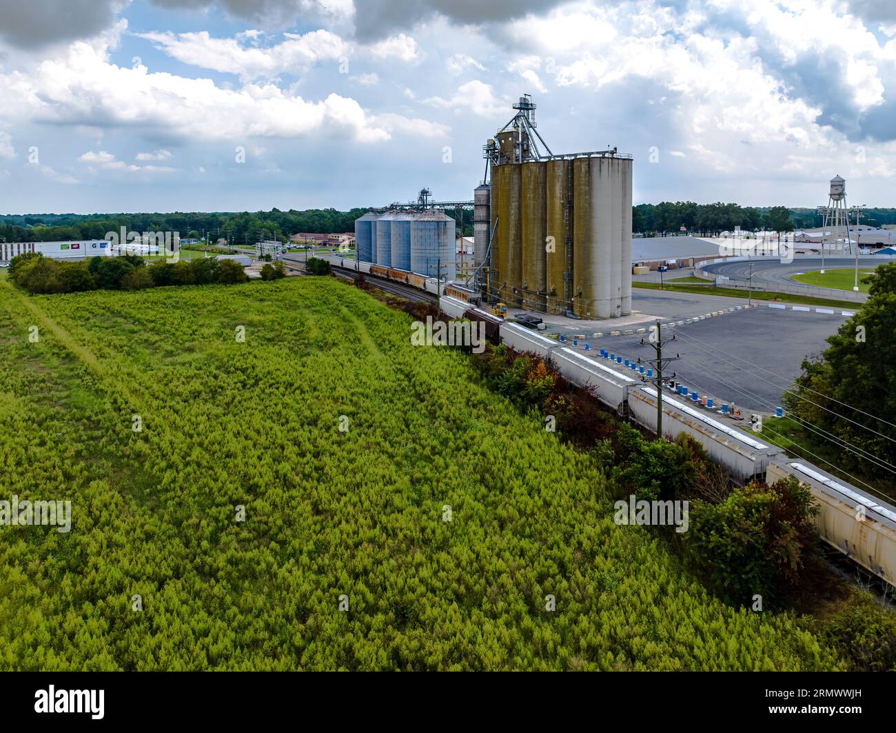 Aerial view of a long freight train traveling through the scenic ...