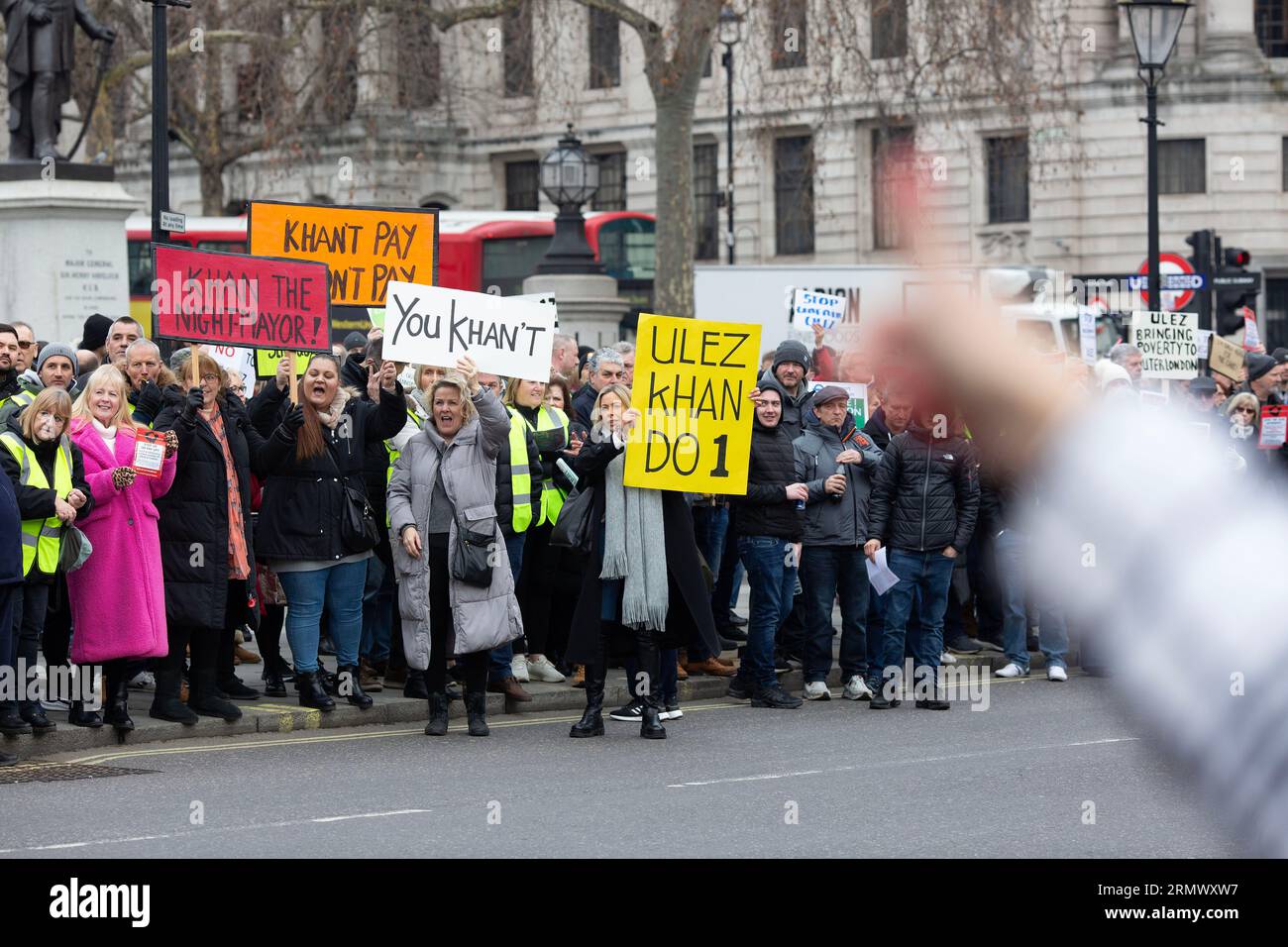 Participants gather with placards during a protest against the ...