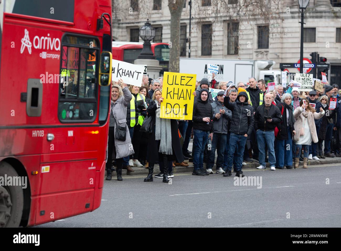 Participants gather with placards during a protest against the ...