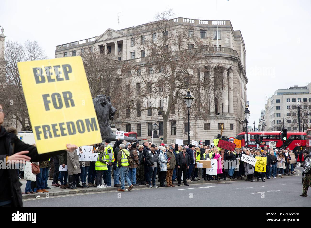 Participants gather with placards during a protest against the ...