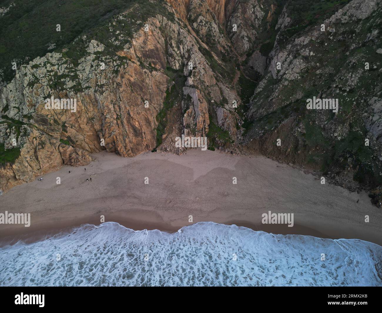 An aerial view of Amazing Ursa beach near Cabo da Roca in Sintra ...