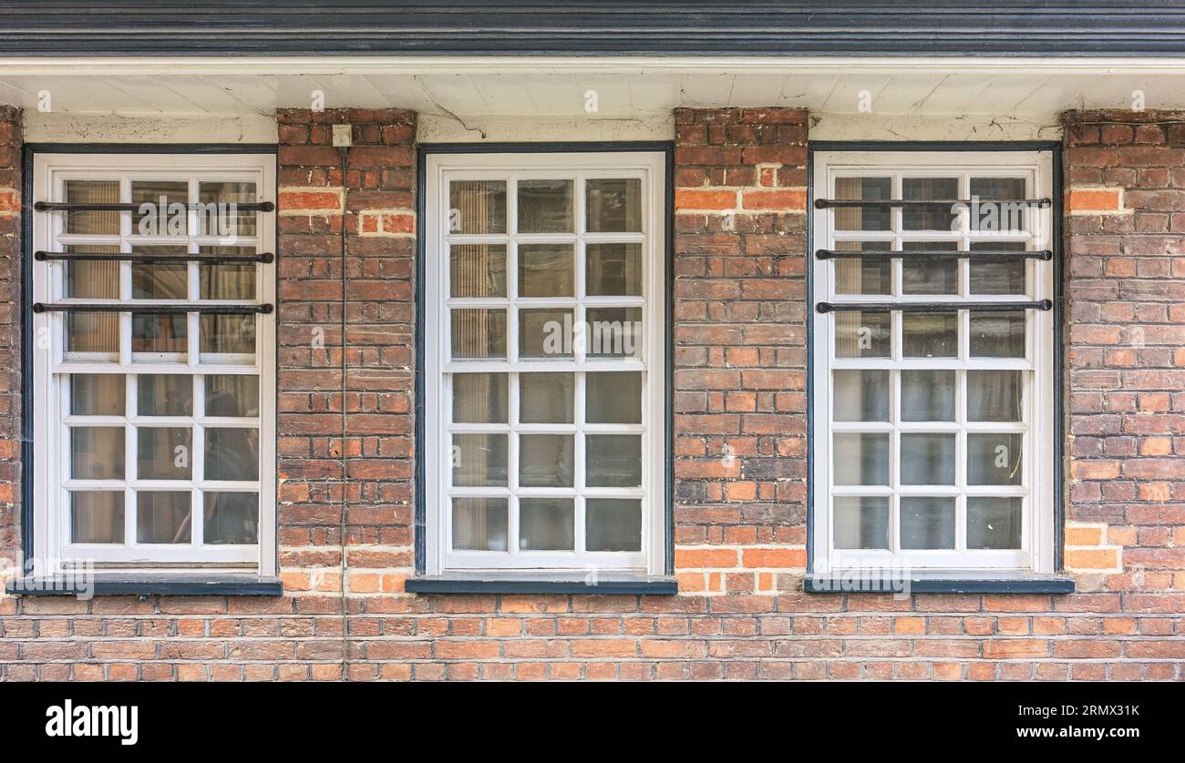 A trio of barred windows, Oxford, England Stock Photo - Alamy