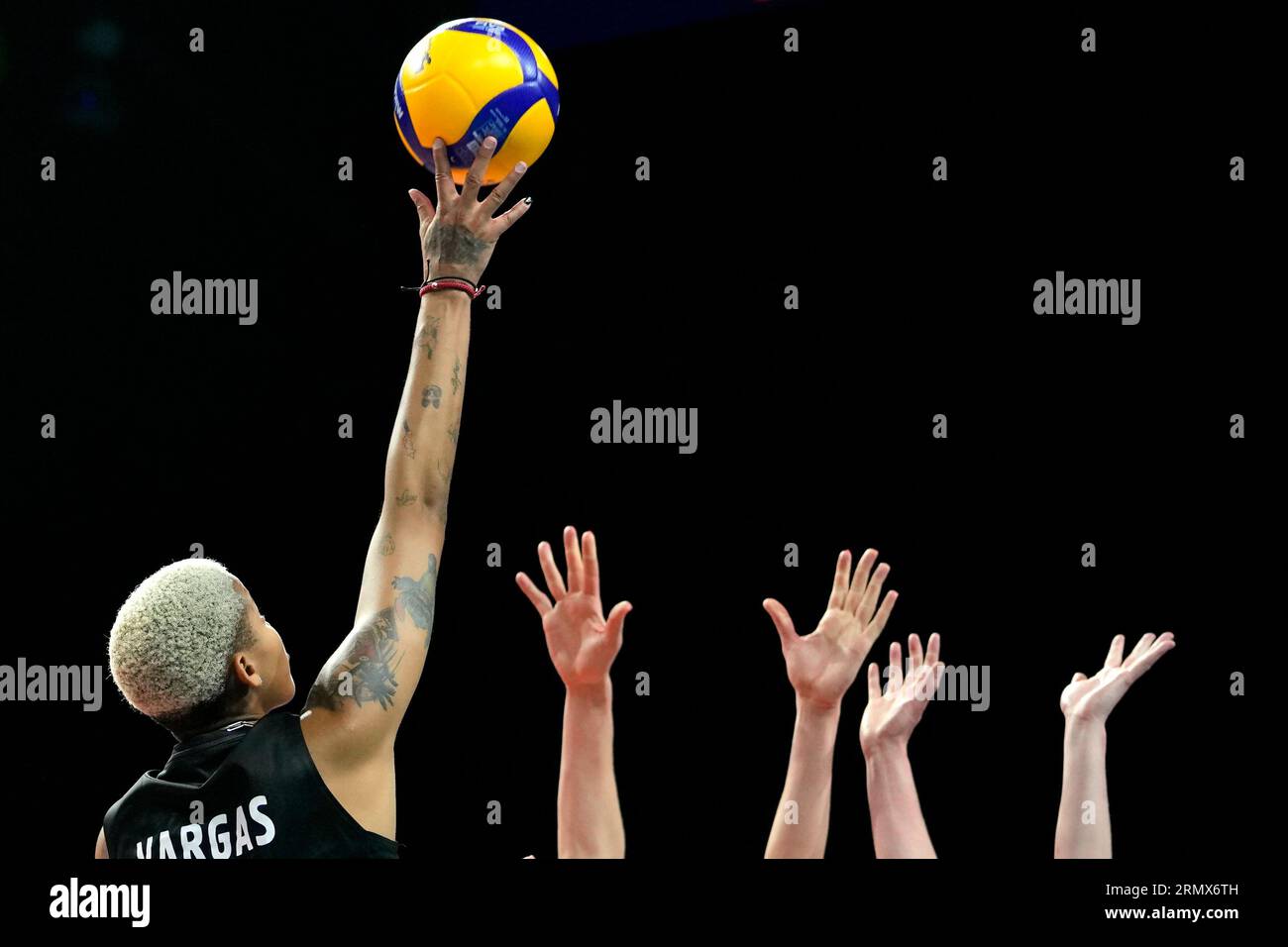 Turkey's Melissa Theresa Vargas, left, attempts to put the ball over ...