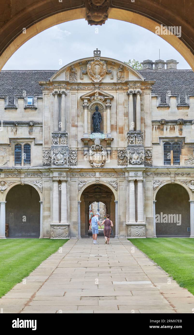 A couple of tourists leave the Canterbury Quad at St John's College ...
