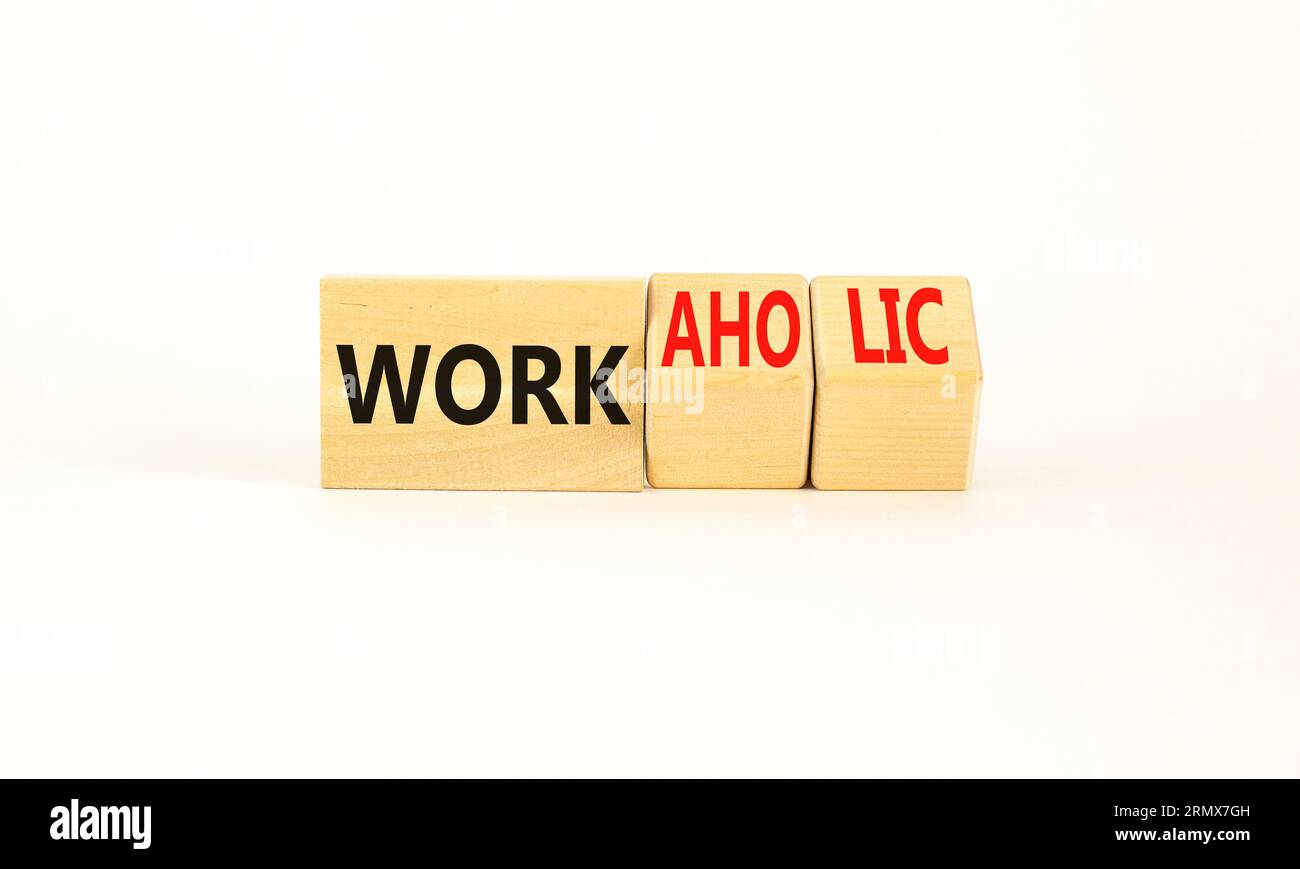 Work or workaholic symbol. Concept words Work or Workaholic on wooden ...