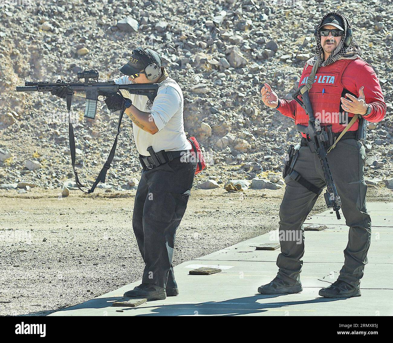 Academy instructor Nate Dusek (right), with Yuma Police Department ...