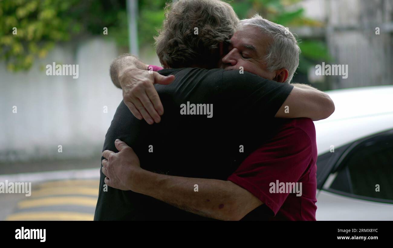Authentic Loving Embrace Between Two Senior Friends Saying Farewell ...