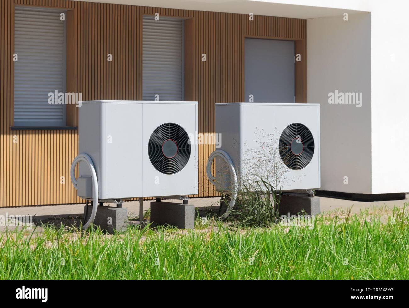 Dual Eco-Friendly Air Source Heat Pumps at Contemporary Residence Stock ...