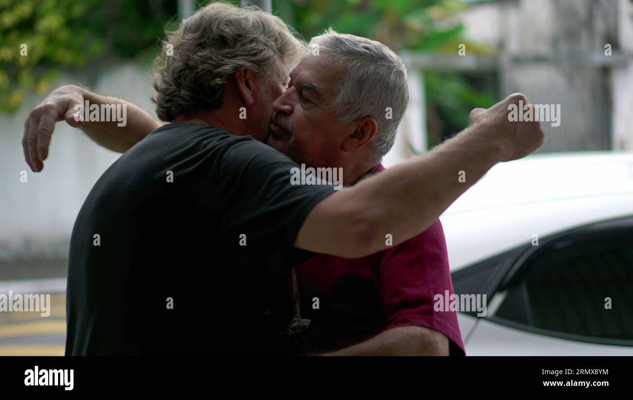 Authentic Loving Embrace Between Two Senior Friends Saying Farewell ...