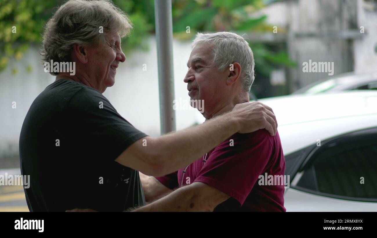 Authentic Loving Embrace Between Two Senior Friends Saying Farewell ...