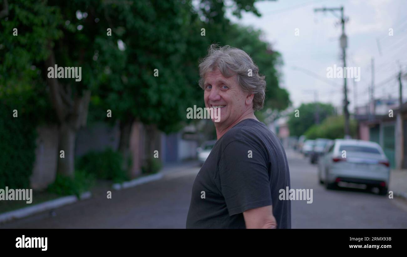 Mature man turning back hi-res stock photography and images - Alamy