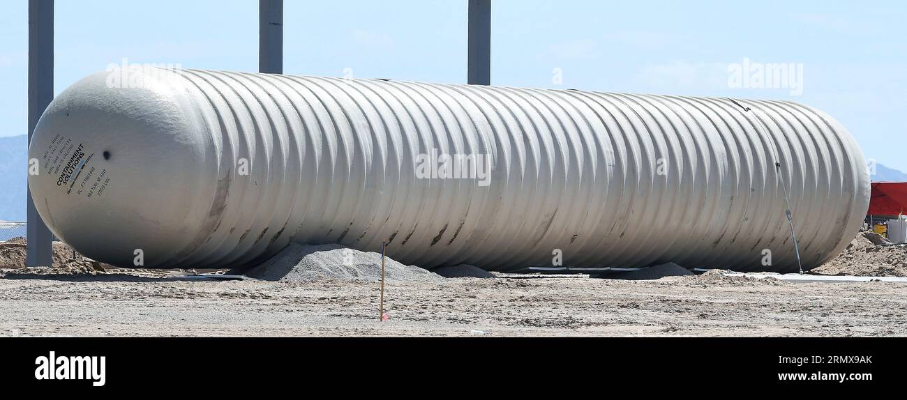 A 40,000-gallon fuel container waits to be installed at the new Maverik ...