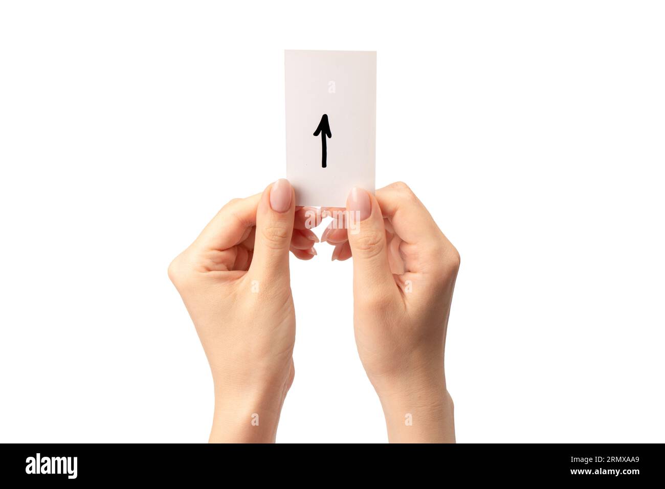 Arrow sign on a card in a woman hand isolated on a white background ...
