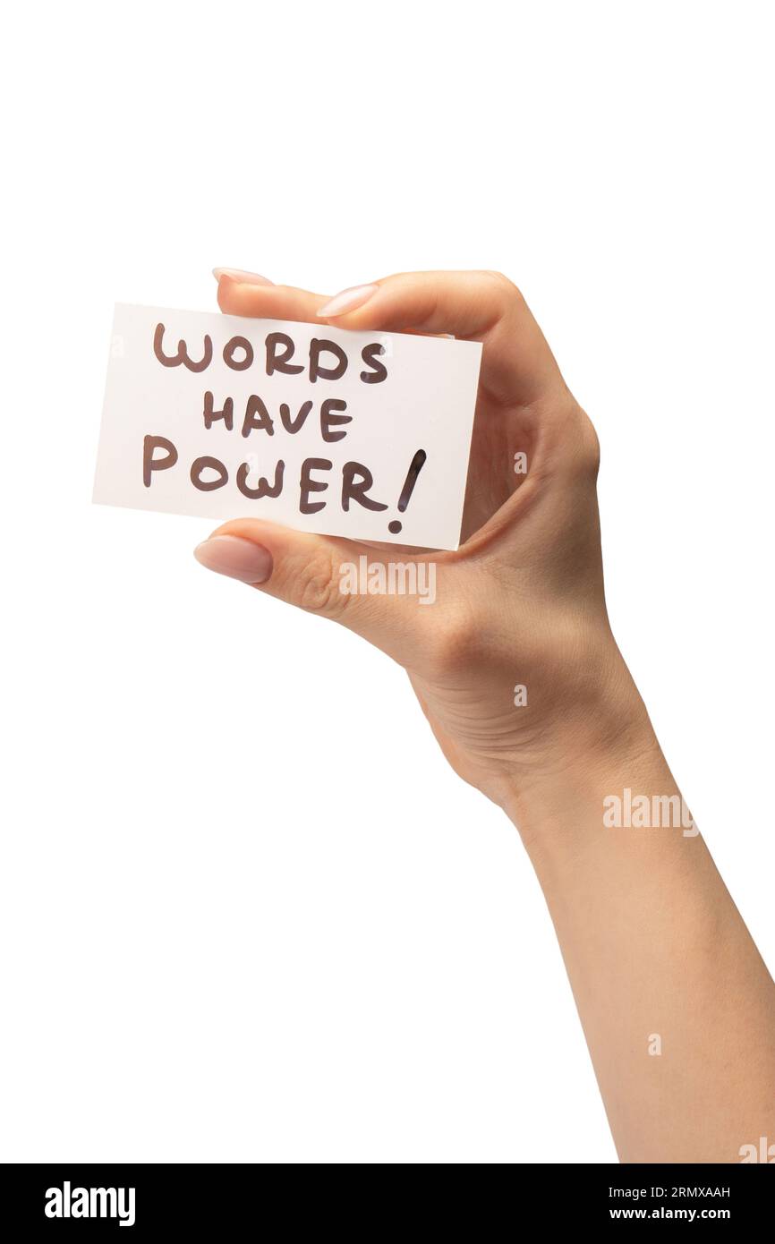 Words have power text on a card in a woman hand isolated on a white ...