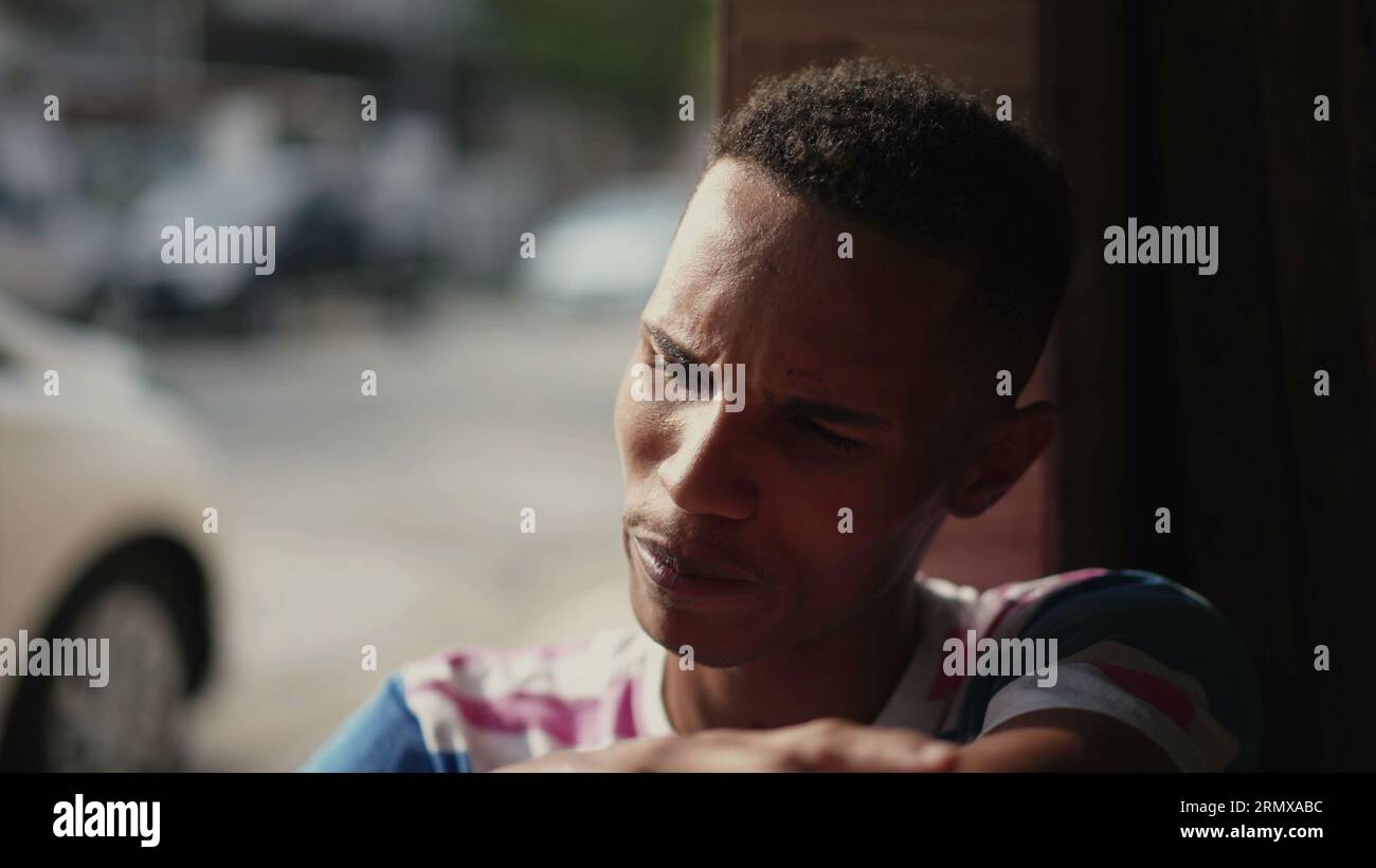 Worried African American young person feeling emotion pressure with ...