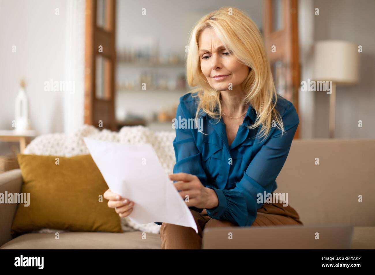 Portrait businesswoman reading papers hi-res stock photography and ...