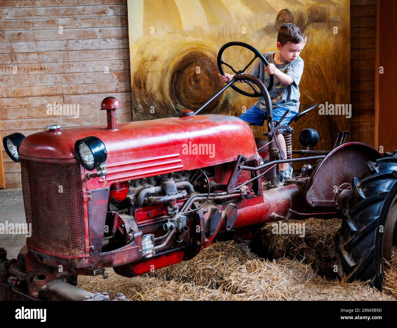 Child tractor trailer not toy hi-res stock photography and images - Alamy