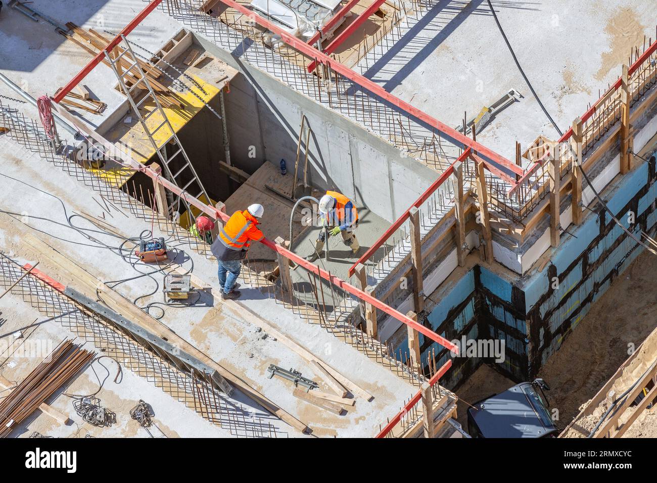 Top view of construction site during concreting of basement stairs ...