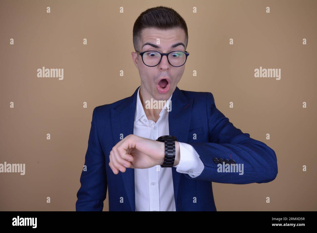 Shocked Young Handsome Elegant Man Checking Time on His Watch on ...