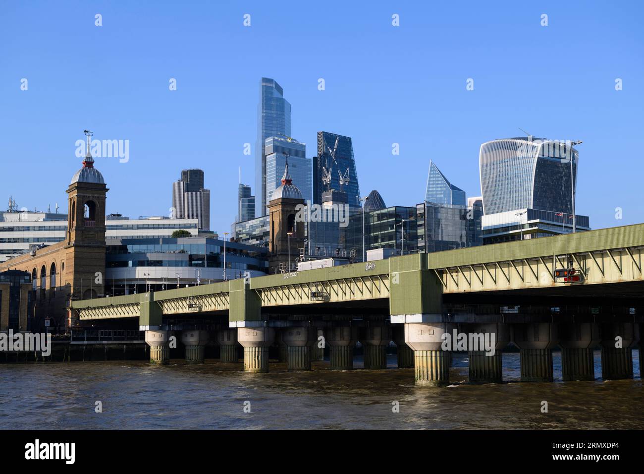 A view of Cannon Street railway bridge and station with the skyscrapers ...