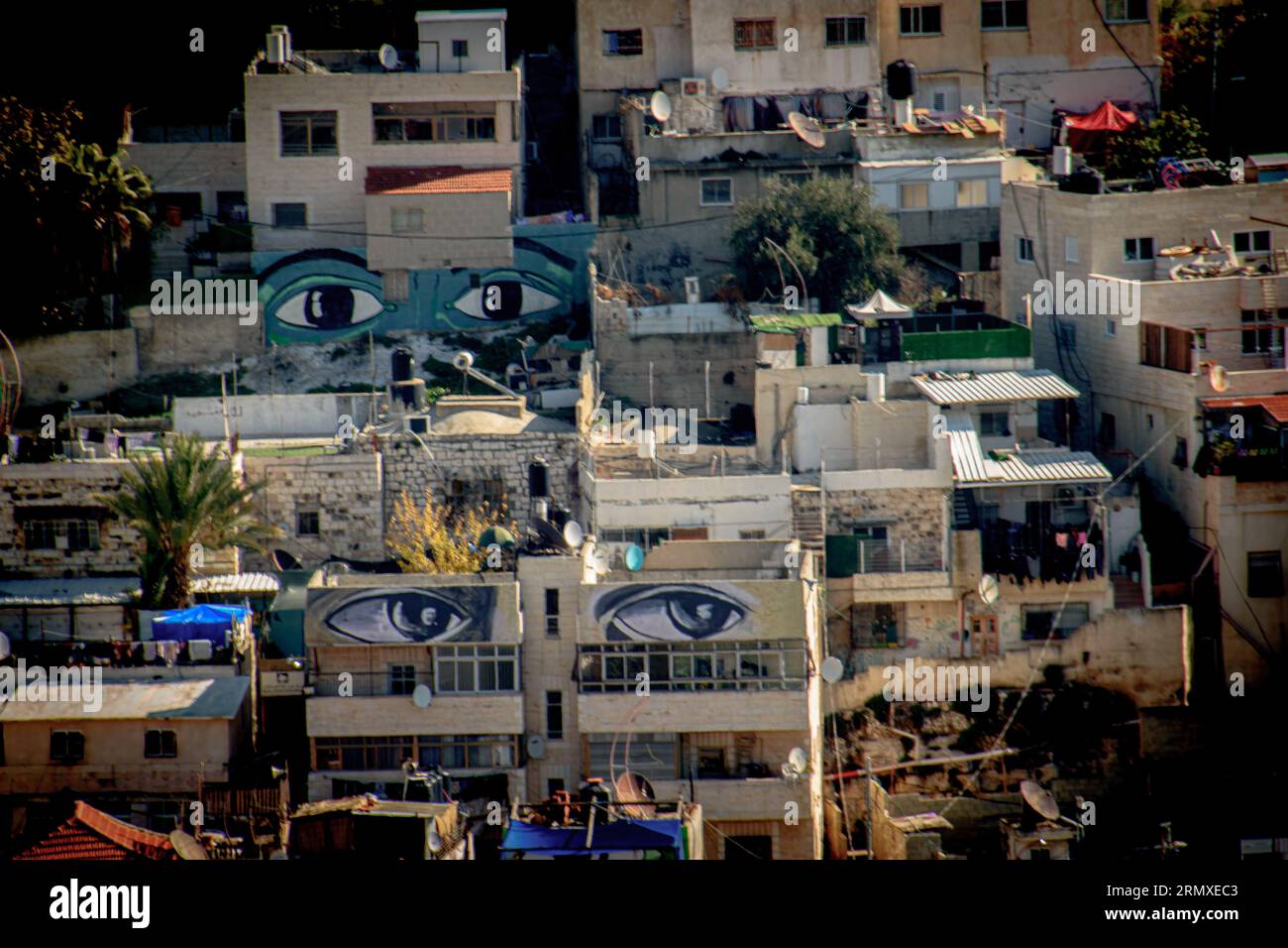 Aerial view of a large modern cityscape featuring tall skyscrapers and ...
