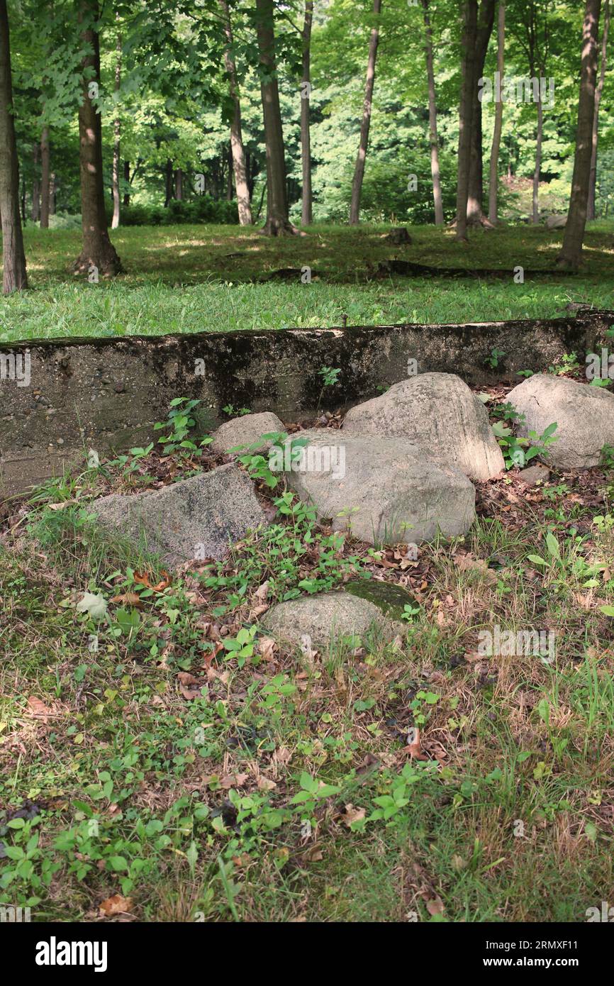Old abandoned concrete slab foundation of a long gone building and home ...