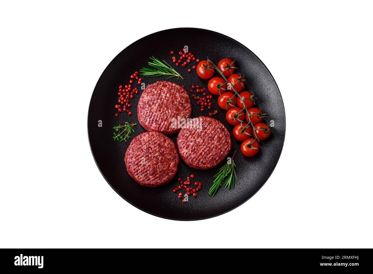Fresh raw ground beef burger patty with salt and spices on textured ...