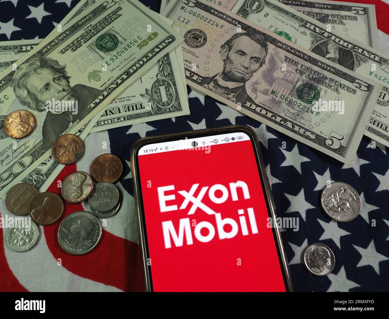 In this photo illustration Exxon Mobil Corporation logo is seen ...