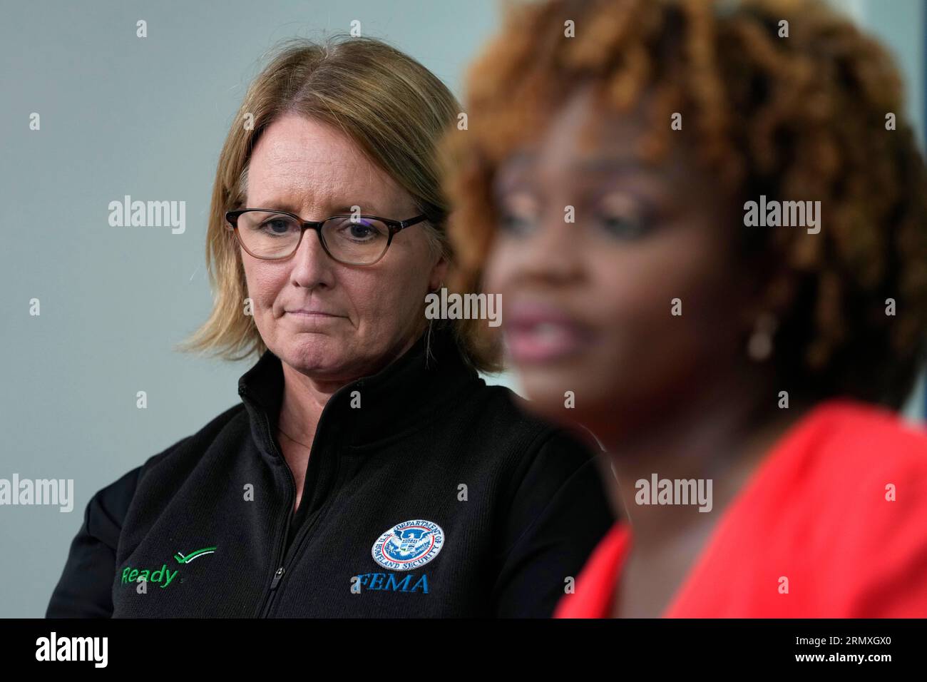 Federal Emergency Management Agency administrator Deanne Criswell, left ...