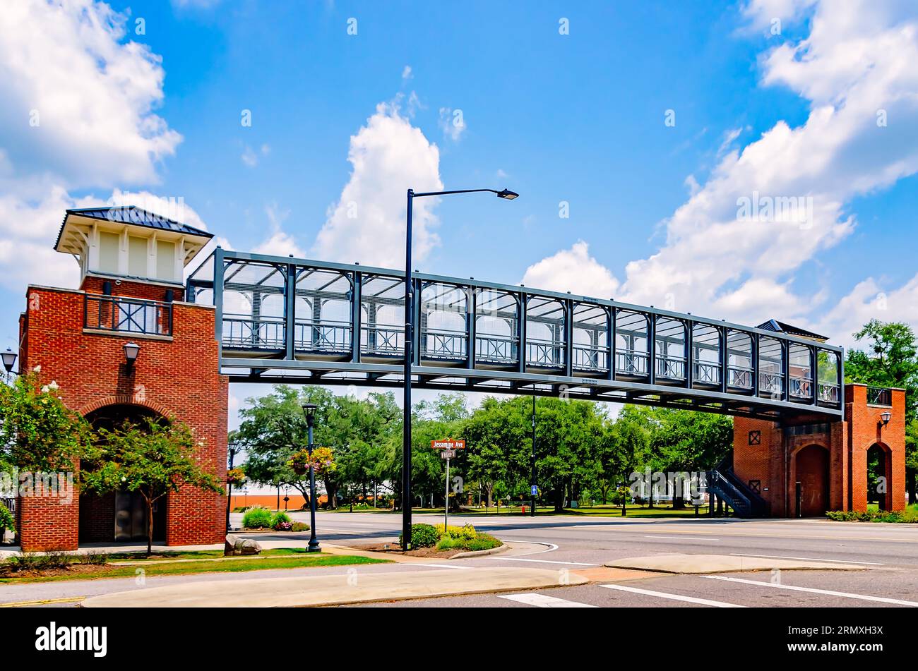 A pedestrian bridge connects John B. Foley Park and downtown Foley near ...