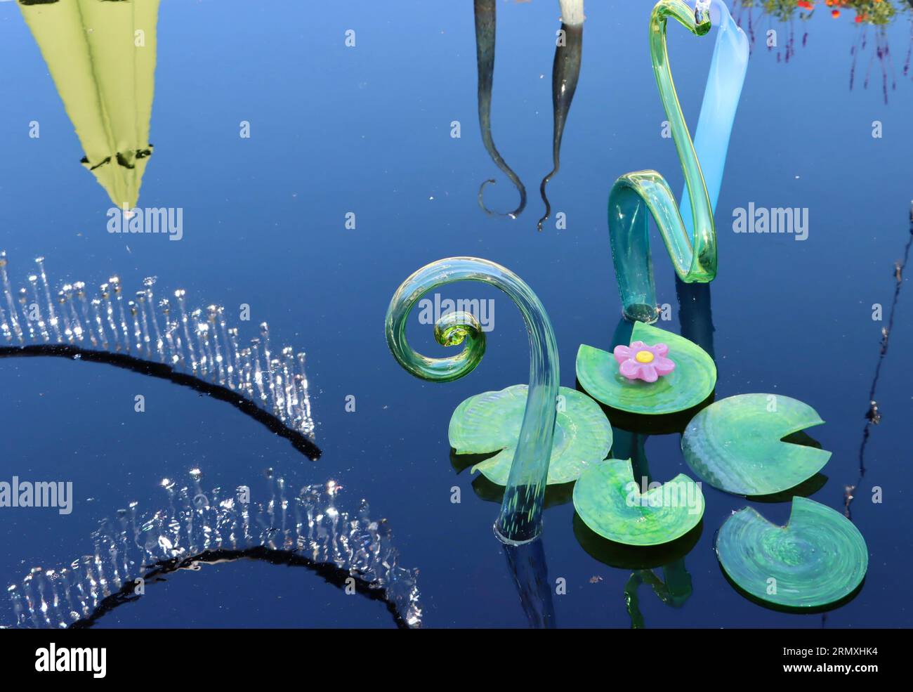 Large-scale glass-blown pieces by The Glass Asylum in the reflecting ...