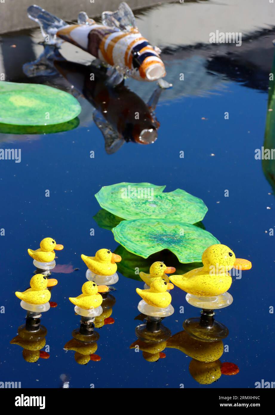 Large-scale glass-blown pieces by The Glass Asylum in the reflecting ...