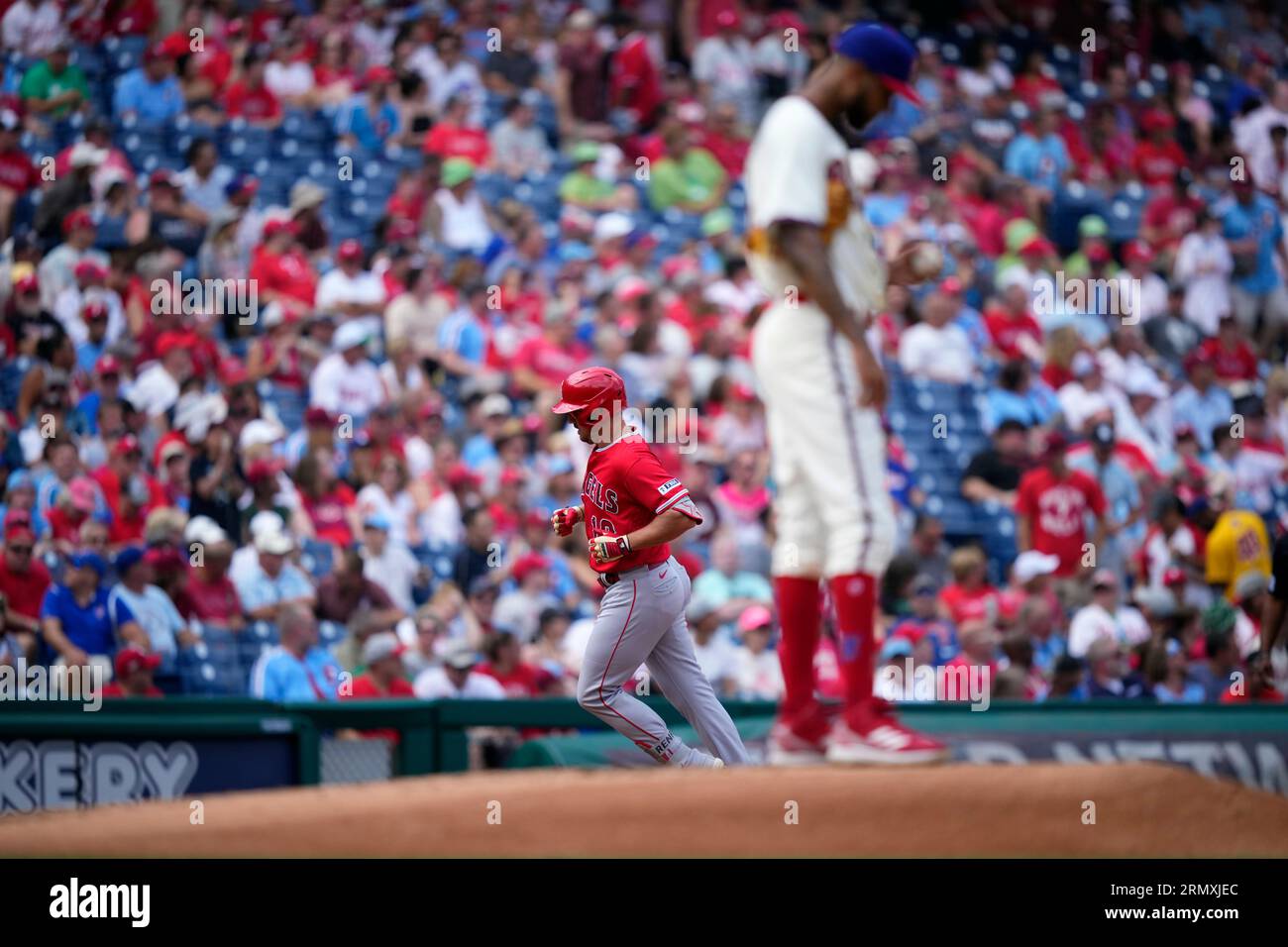 Los Angeles Angels' Hunter Renfroe, left, rounds the bases past ...