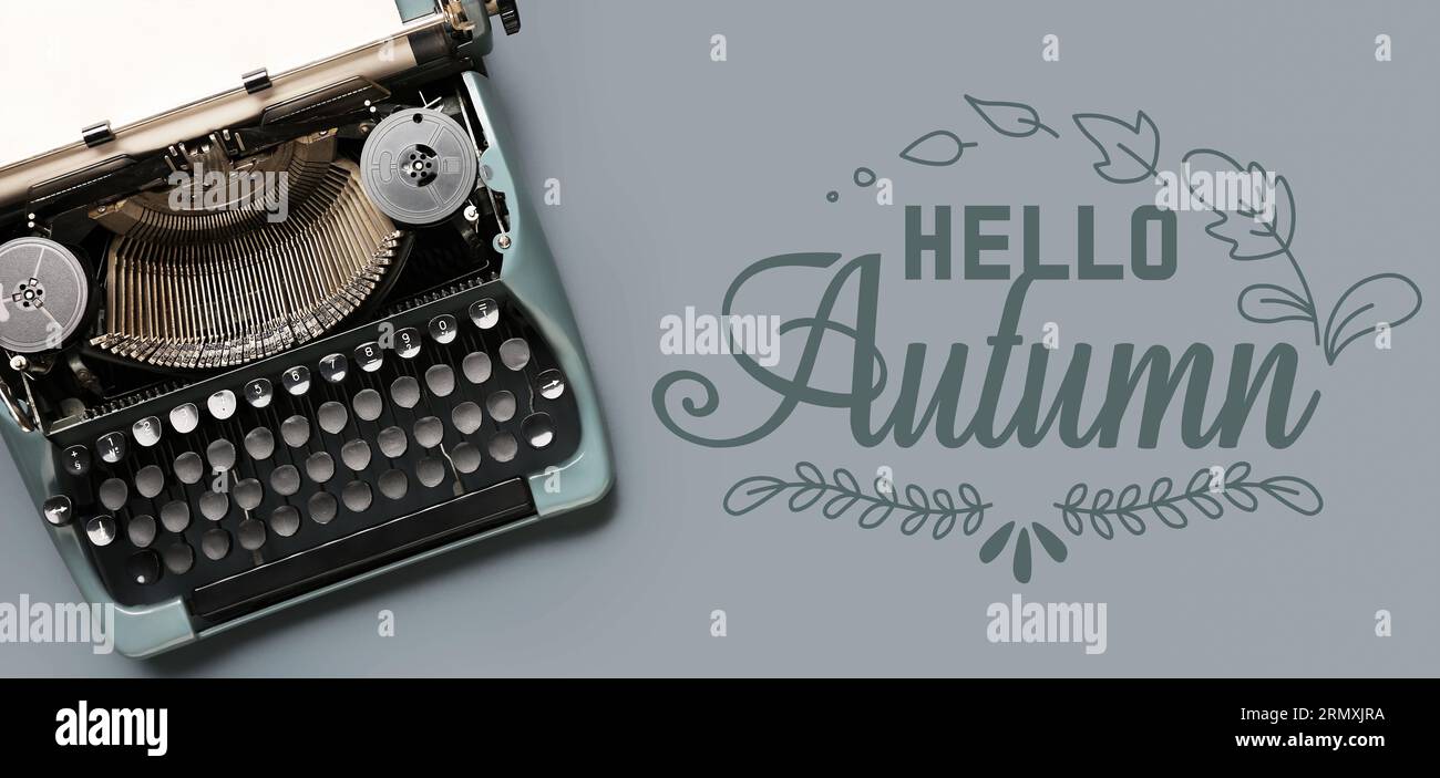 Vintage typewriter with text HELLO AUTUMN on grey background Stock ...