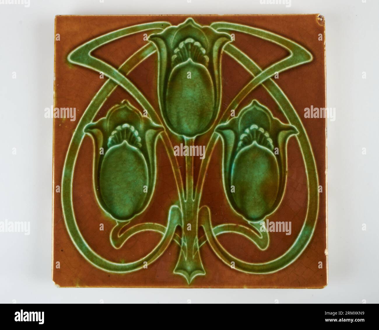 Antique 1900s T & R Boote Art Nouveau tulip pottery tile Stock Photo ...