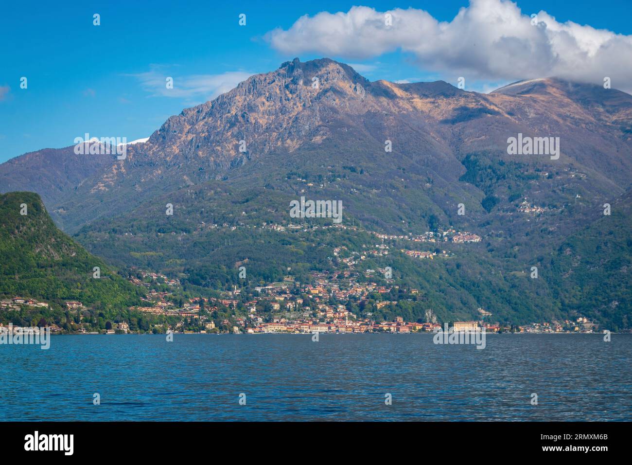 Scenic view of Menaggio and Monte Grona, Lake Como, Italy against blue ...