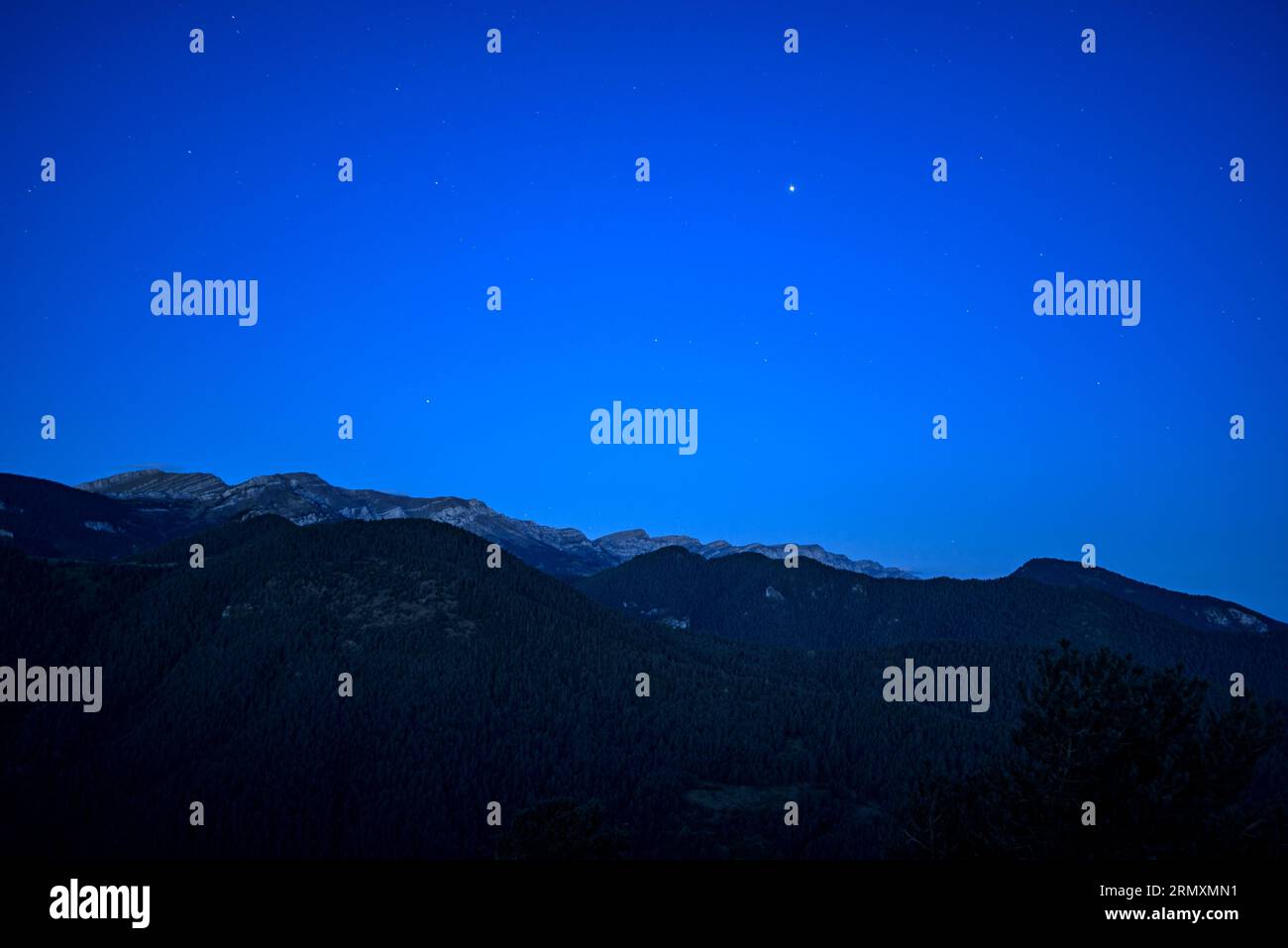 Blue hour in the Serra de Cadí range seen from the viewpoint of Cap Ras ...