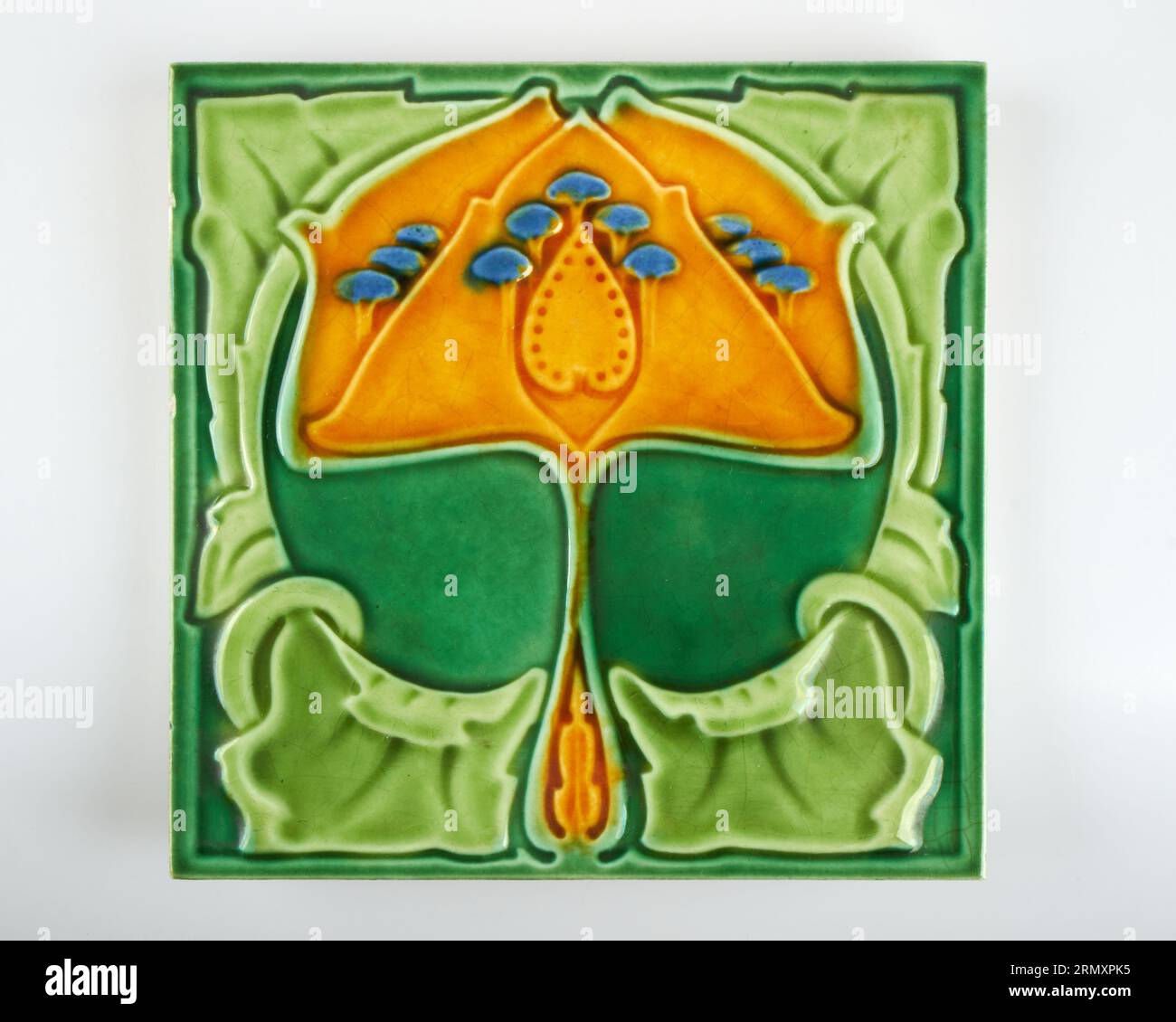 Antique 1900s T. A. Simpson Art Nouveau amber and blue pottery tile ...