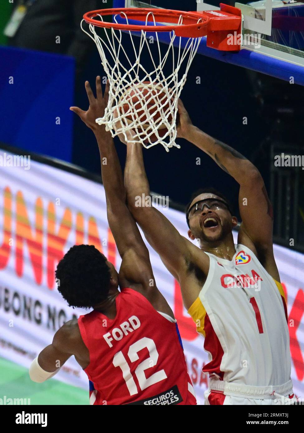 Quezon City, Philippines. 30th Aug, 2023. Aleem Ford (L) of Puerto Rico men basketball team and ...