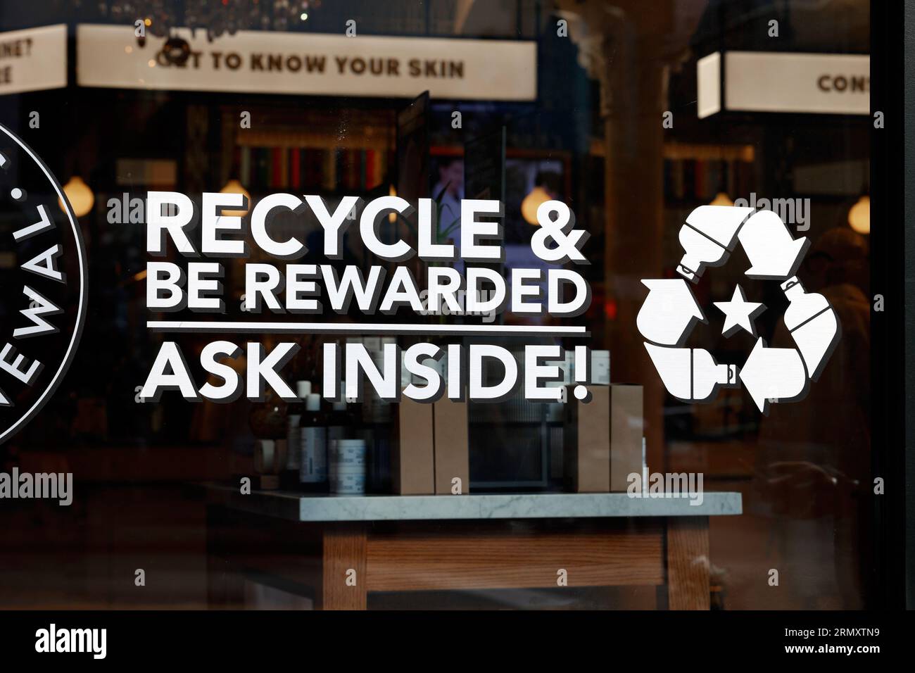 Kiehl's skincare store window signage promoting their loyalty program ...